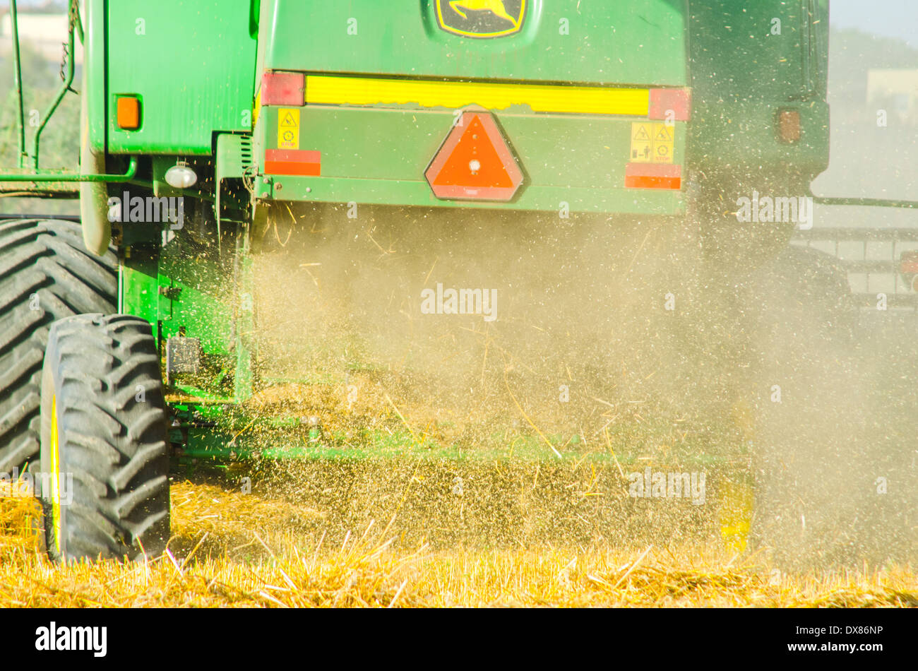 John Deere Combine Harvester Wheat Stock Photos & John Deere Combine ...