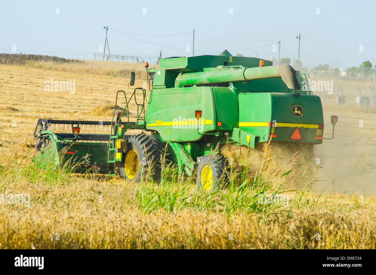 John Deere Combine Harvester Wheat Stock Photos & John Deere Combine ...