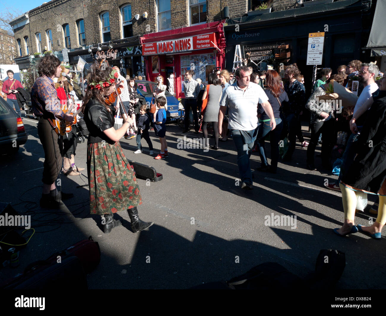 Women busking in the street hi-res stock photography and images - Alamy