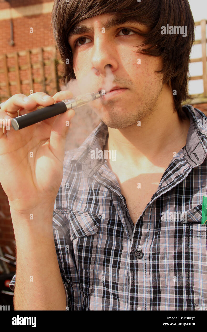 Charlie Webber smoking an E-cigarette, Exmouth. 20-03-2014 Stock Photo ...