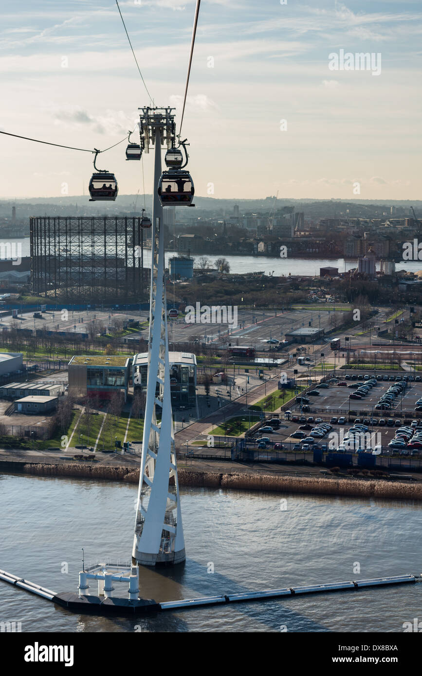 Emirates Air Line Cable Car crosses River Thames between the O2, North ...