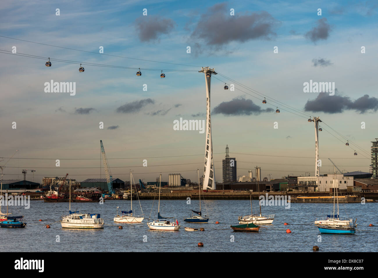 Emirates Air Line Cable Car crosses River Thames between the O2, North ...