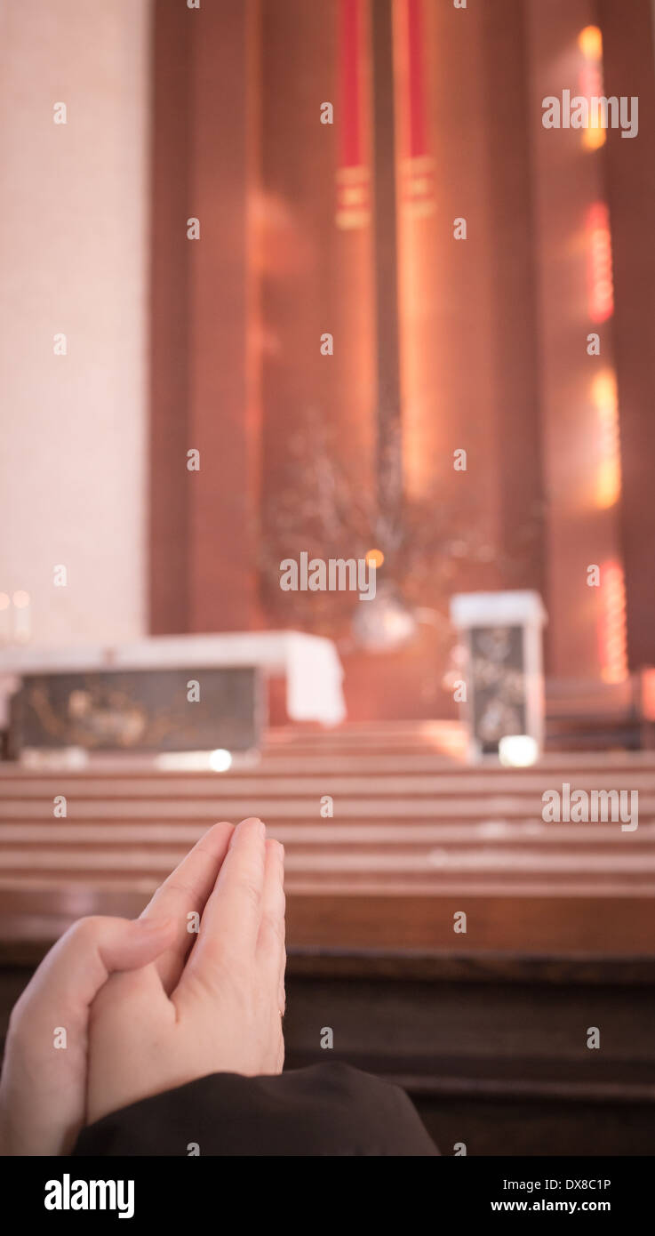 Hands holded in prayer, the faithful of the Catholic Church Stock Photo ...