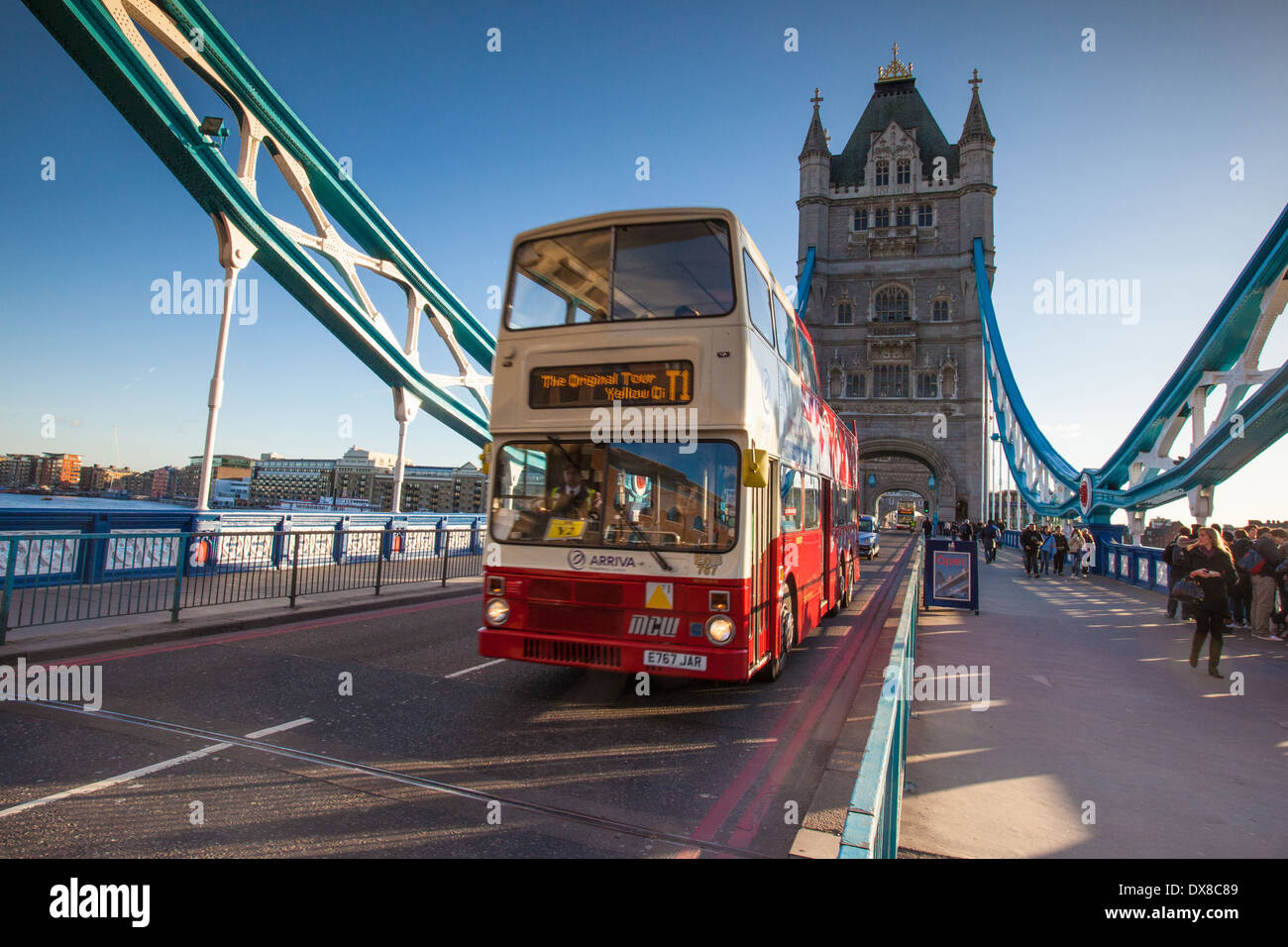London double decker tourist bus on Tower Bridge Stock Photo - Alamy