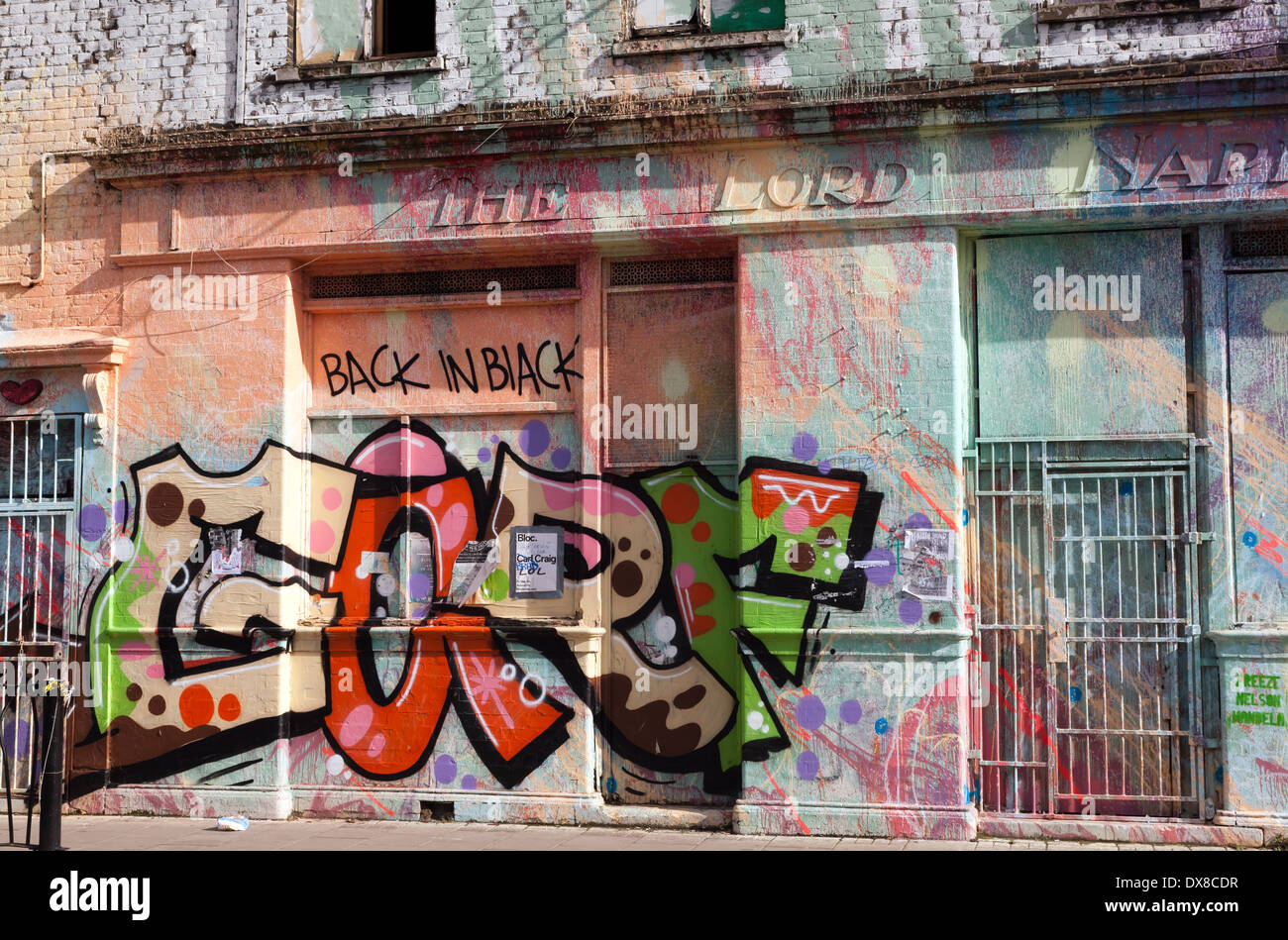 The derelict, Lord Napier Public House, covered in garish graffiti ...
