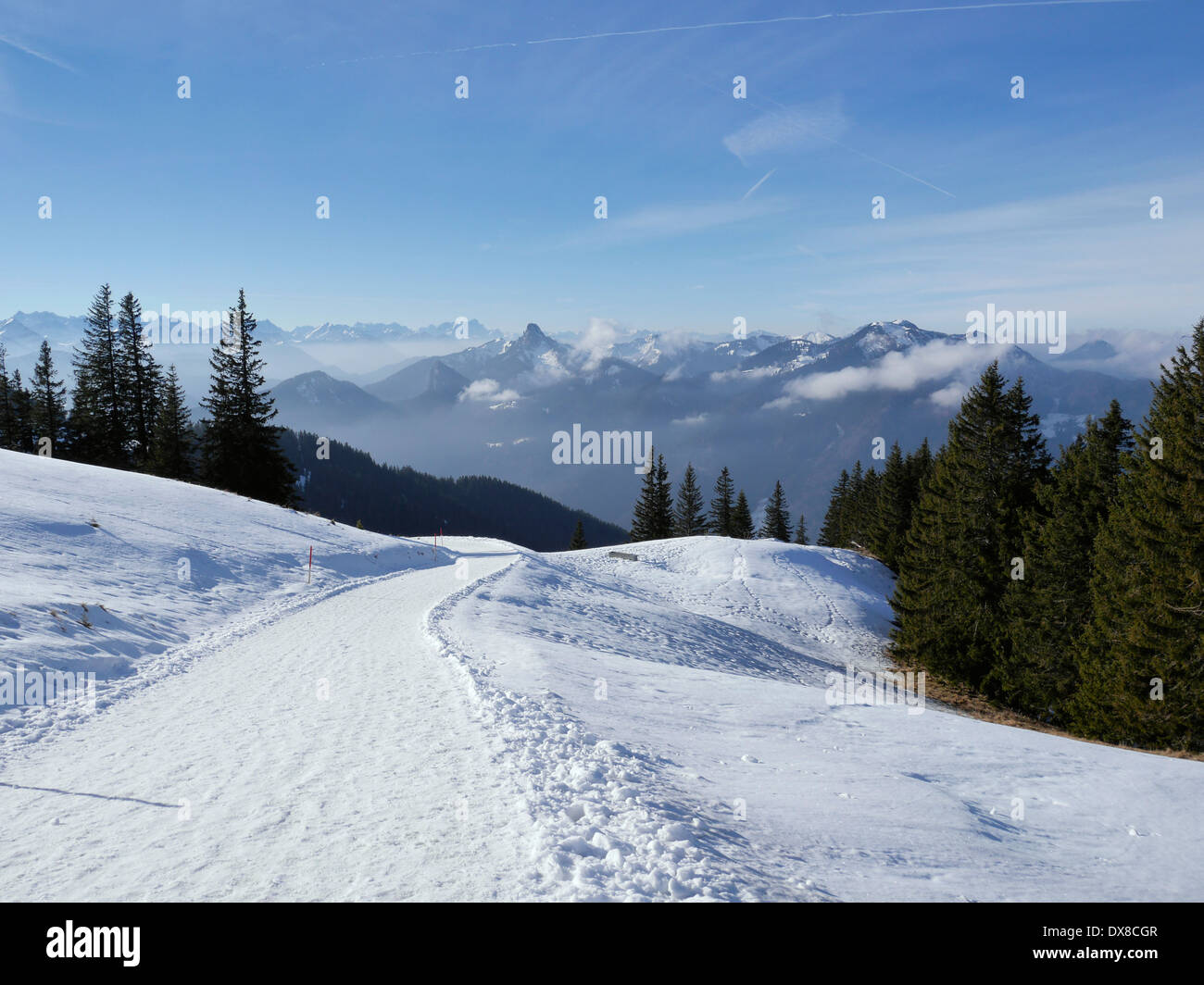view over surrounding mountains from Wallberg hiking trail in winter ...
