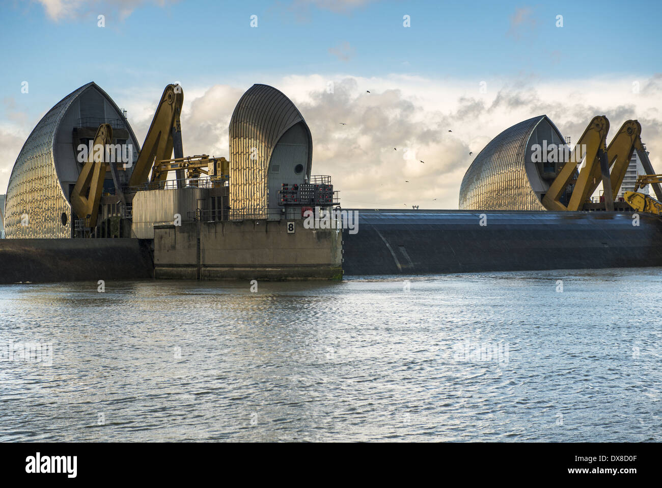 Shown here in the raised position, the Thames Barrier is located ...