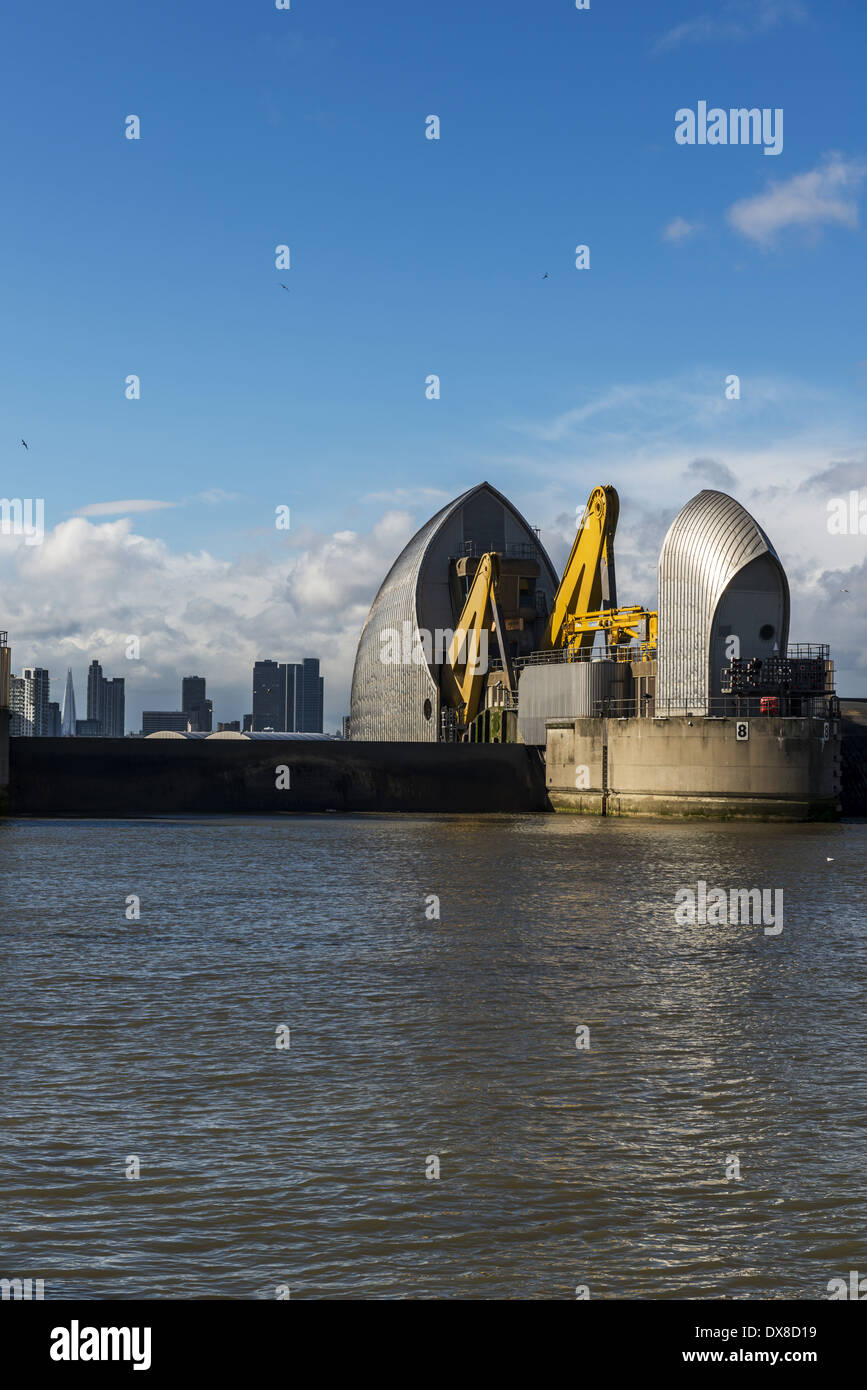 Shown here in the raised position, the Thames Barrier is located ...