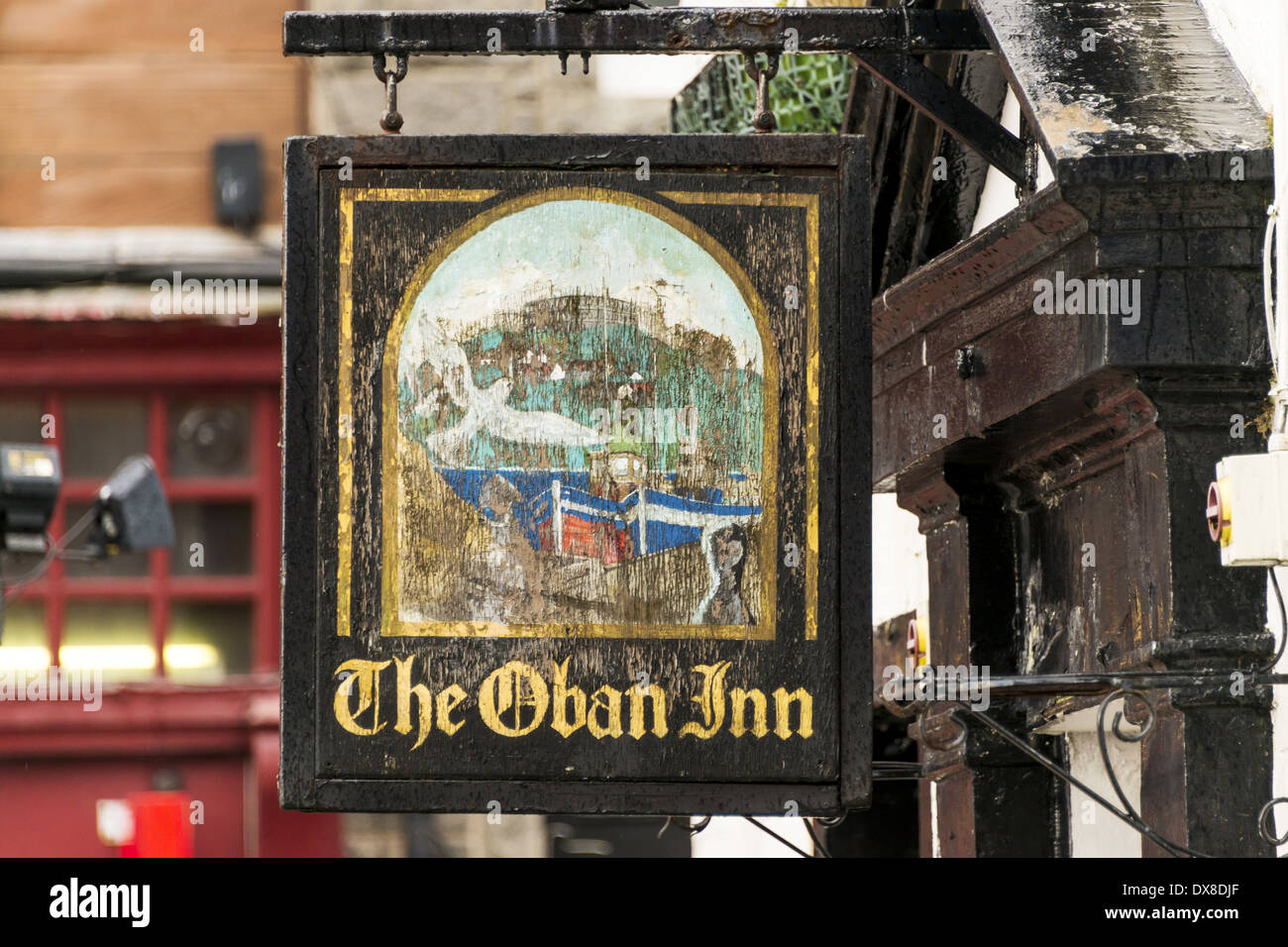 The sign of a now derelict pub, The Oban Inn, in Oban, a resort town ...