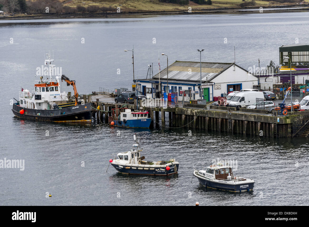 Fishing boats in the harbour at Portree, the largest town on the Isle ...