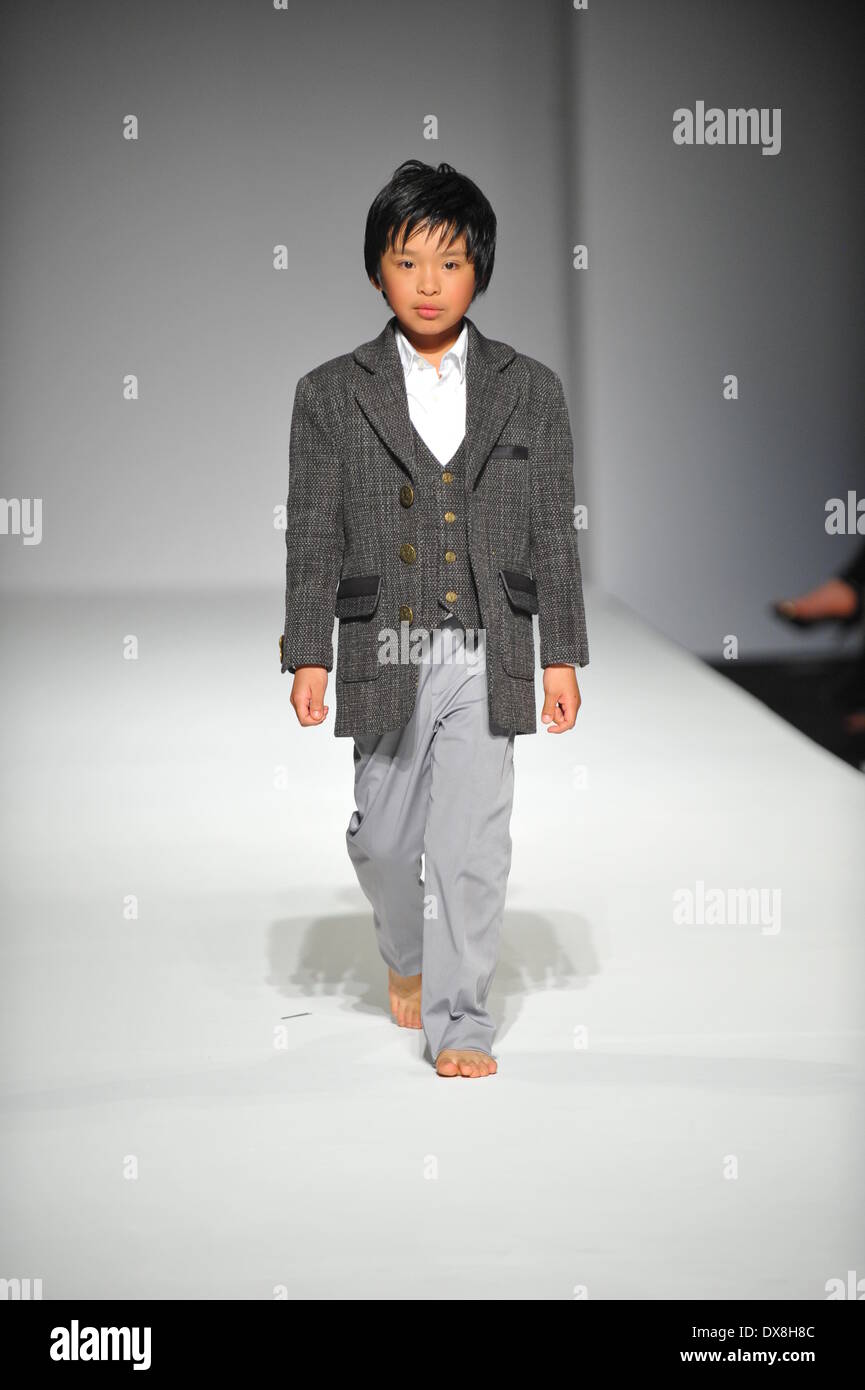 LOS ANGELES, CA - MARCH 10: A child model walks runway at Nancy Vuu ...