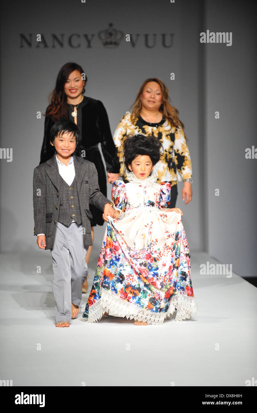 LOS ANGELES, CA - MARCH 10: Designers and child models walk the runway ...