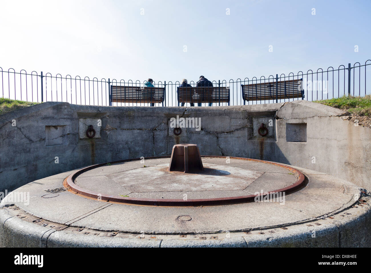 Pivot gun emplacement and people sitting on benches Stock Photo - Alamy