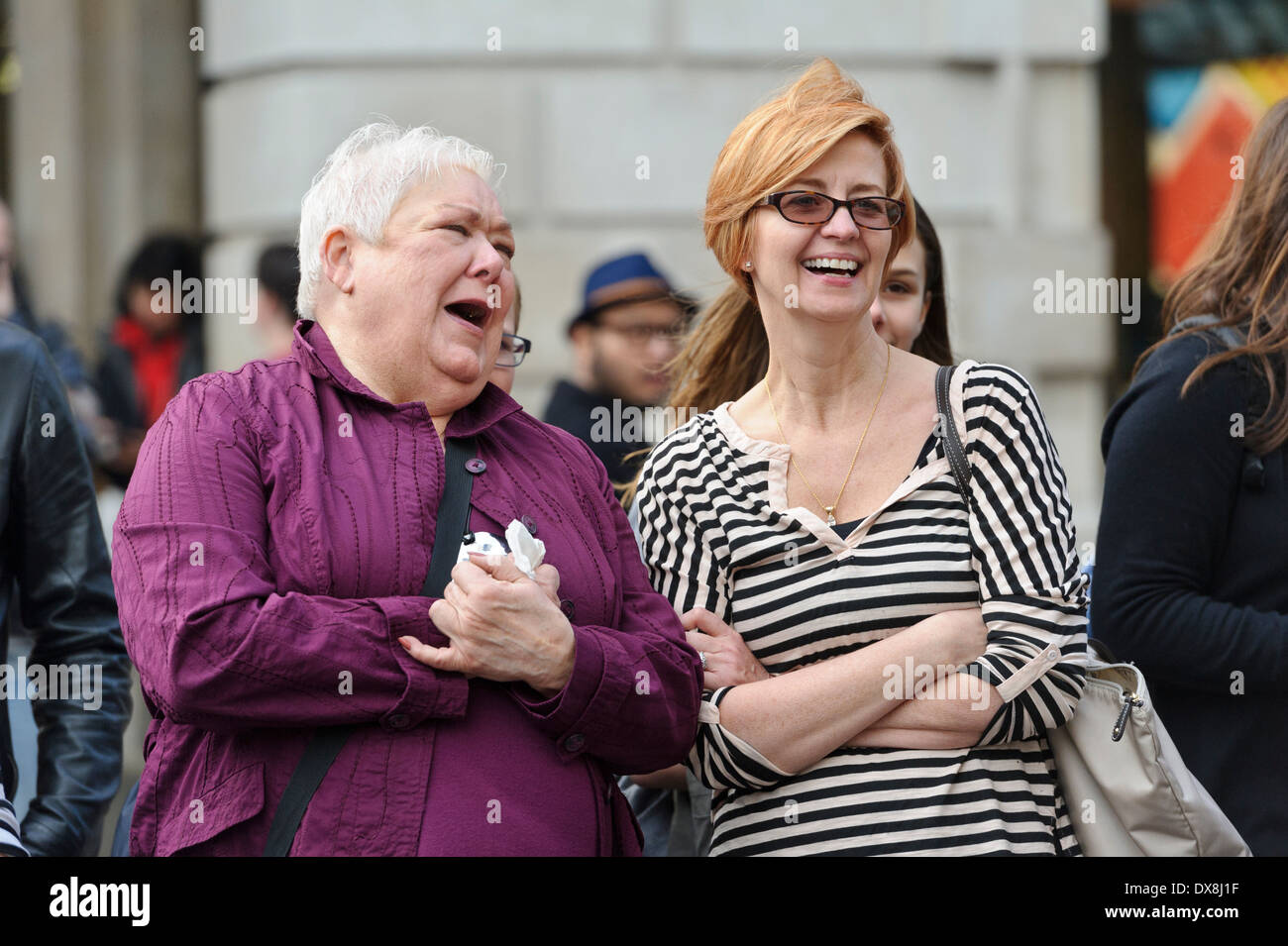 Two women laughing away on the street of Covent Garden, London, England ...