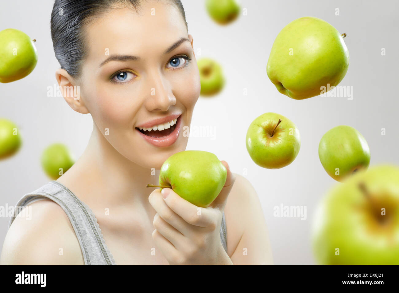 A beautiful slender girl eating healthy food Stock Photo - Alamy
