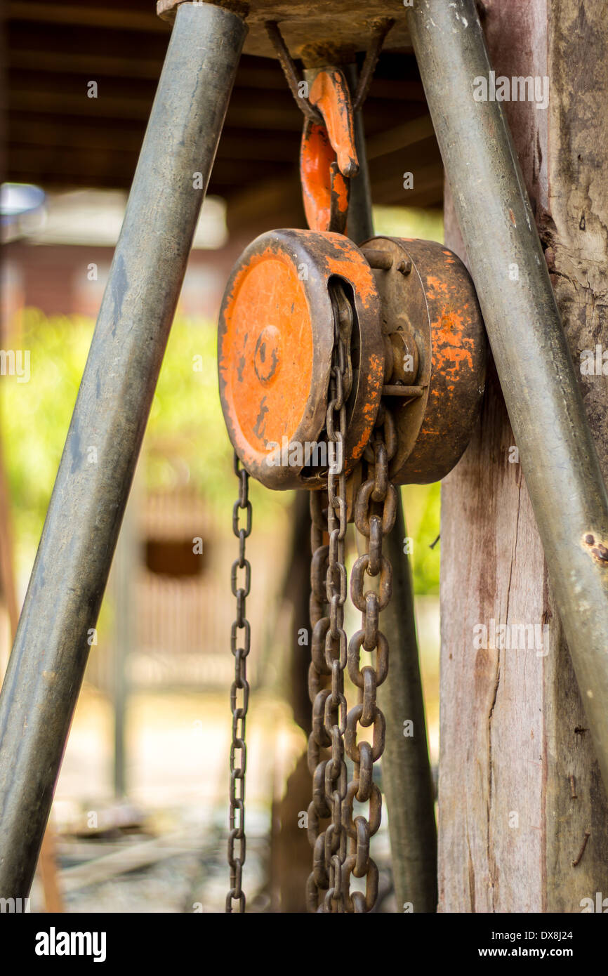 The Chain hoist with a large wooden pole Stock Photo - Alamy