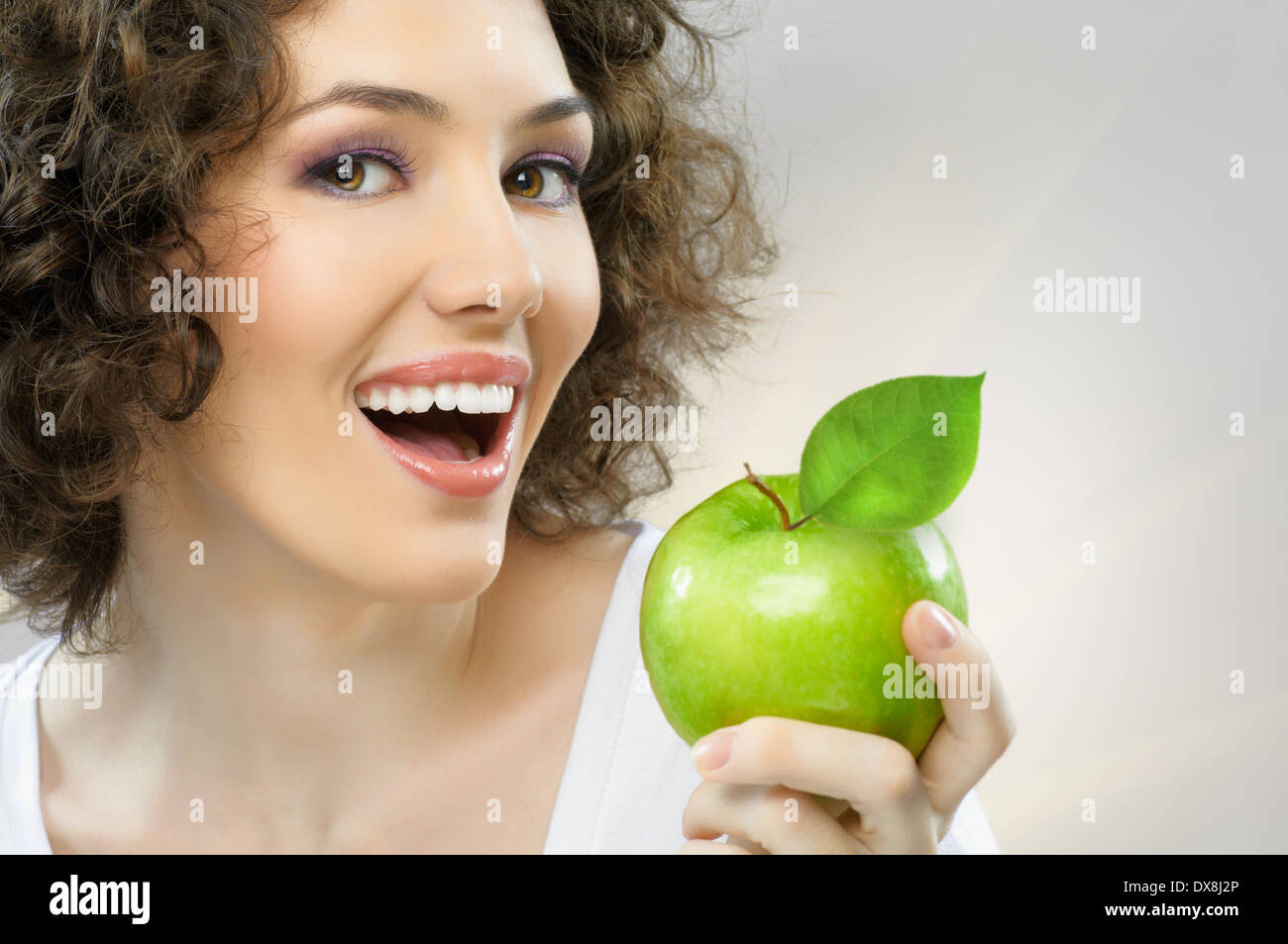 A beautiful slender girl eating healthy food Stock Photo - Alamy