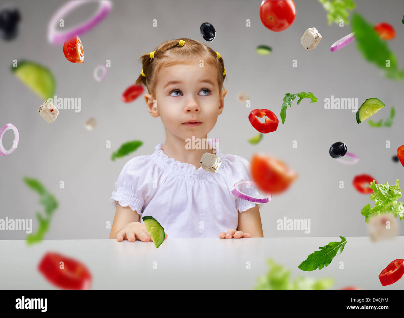 A beautiful girl eating fresh fruit Stock Photo - Alamy