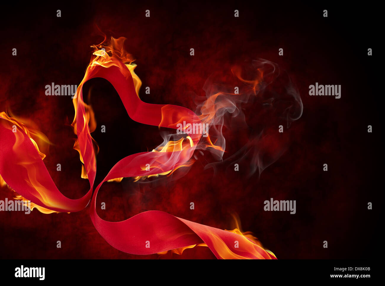 burning red ribbon on the black background Stock Photo - Alamy