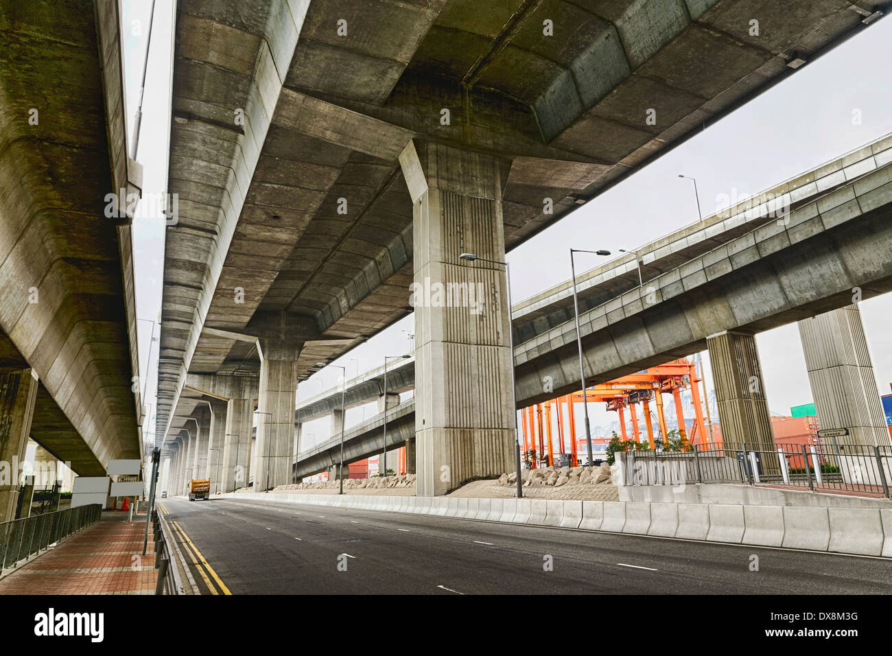 Empty asphalt road under the new expressway line at day Stock Photo - Alamy