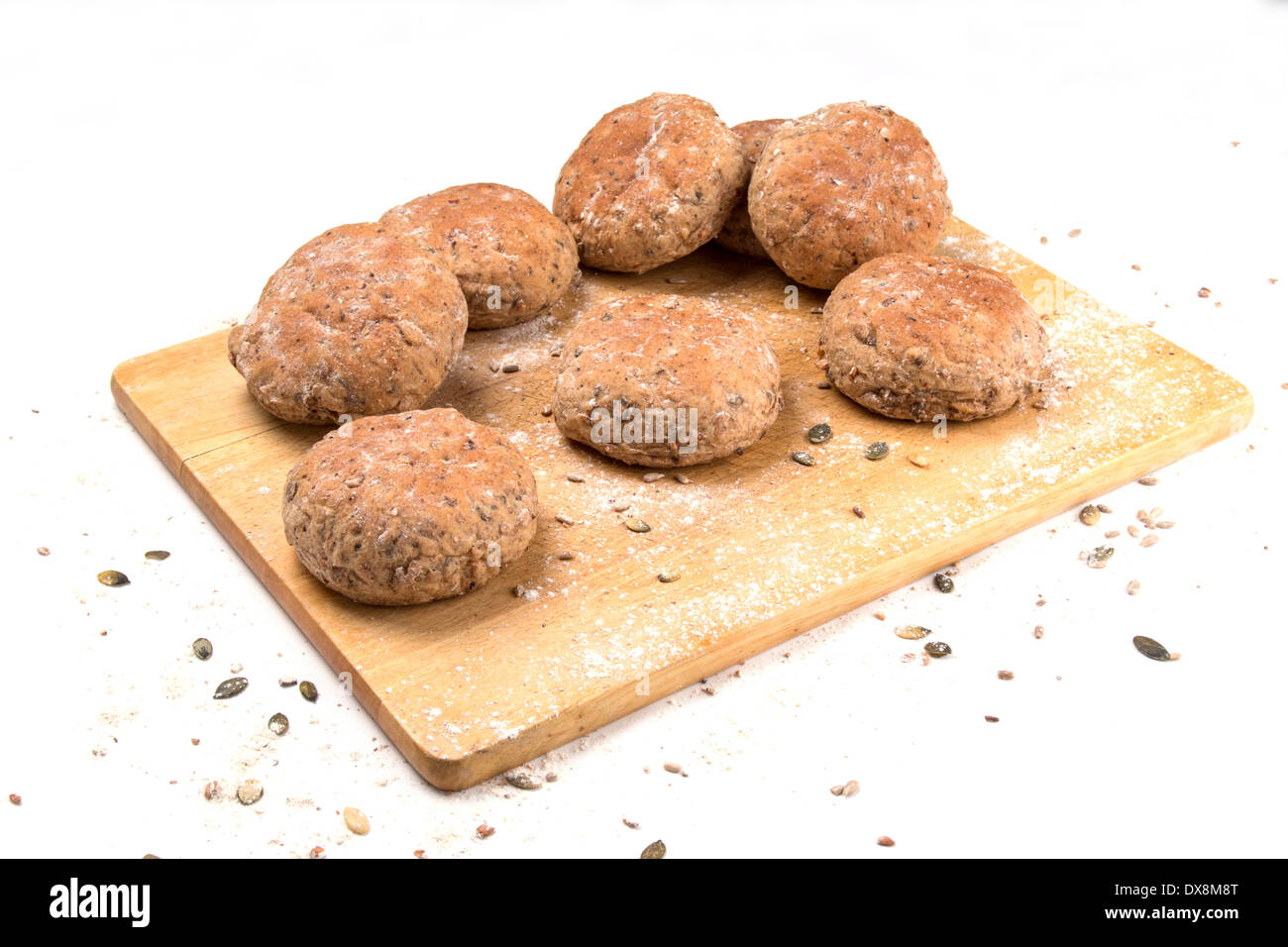 Granary bread bun/baps/cakes on a bread board (8 of 15 Stock Photo - Alamy