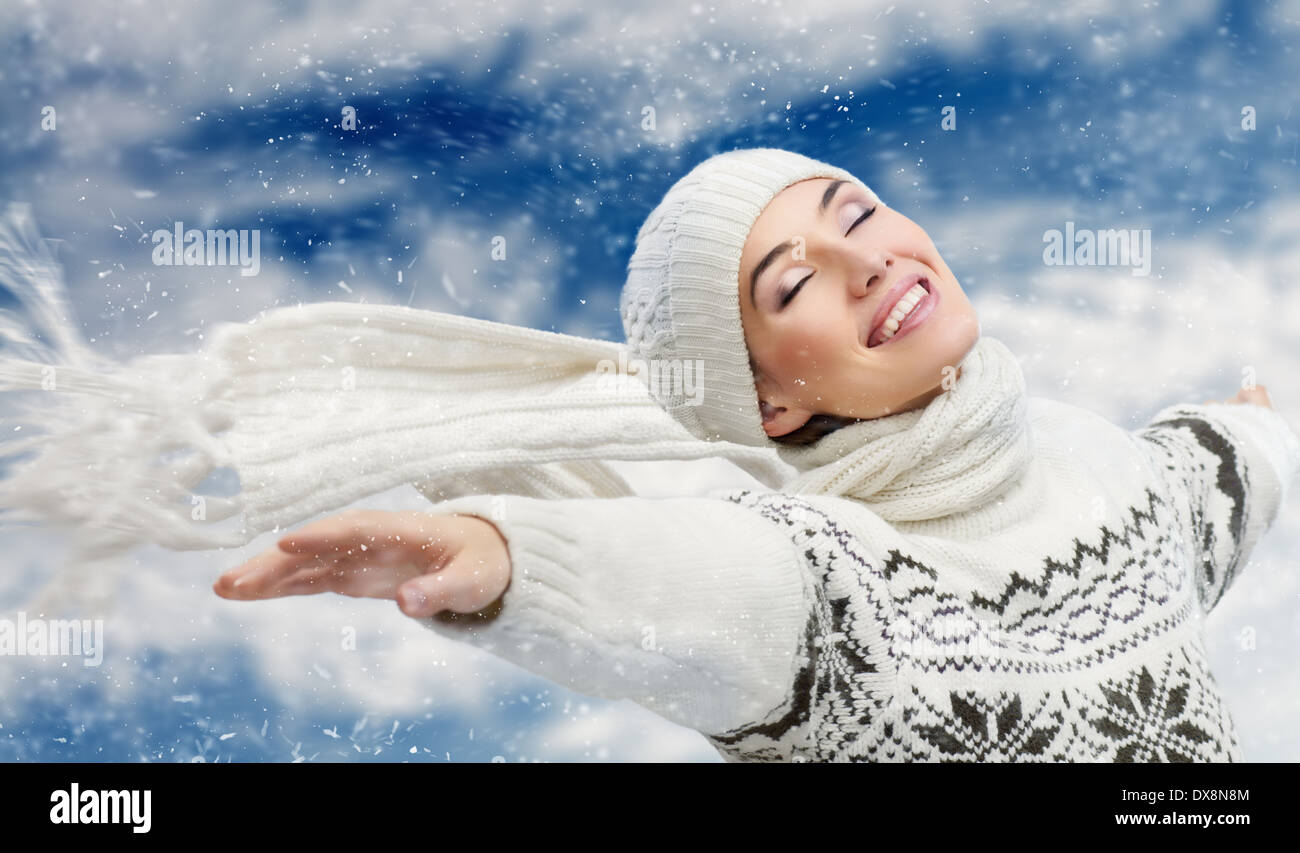 beauty girl on the snow background Stock Photo - Alamy