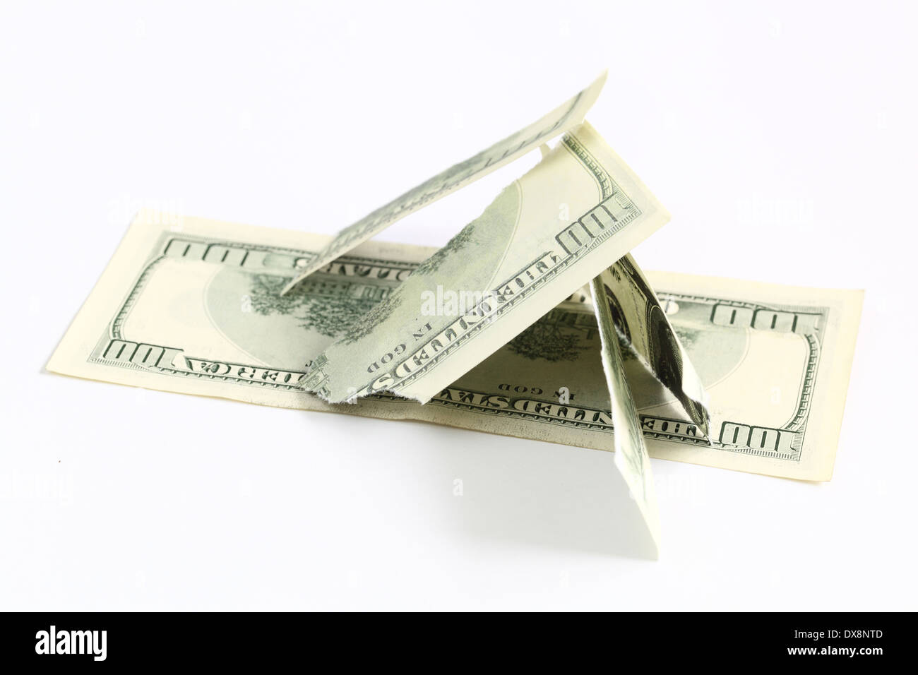 Dollars bill torn apart Stock Photo - Alamy
