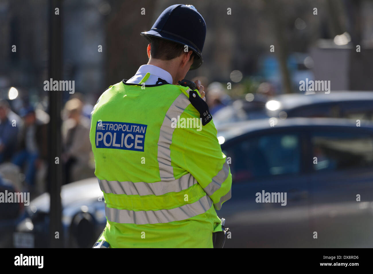 Yellow jacket policeman hi-res stock photography and images - Alamy