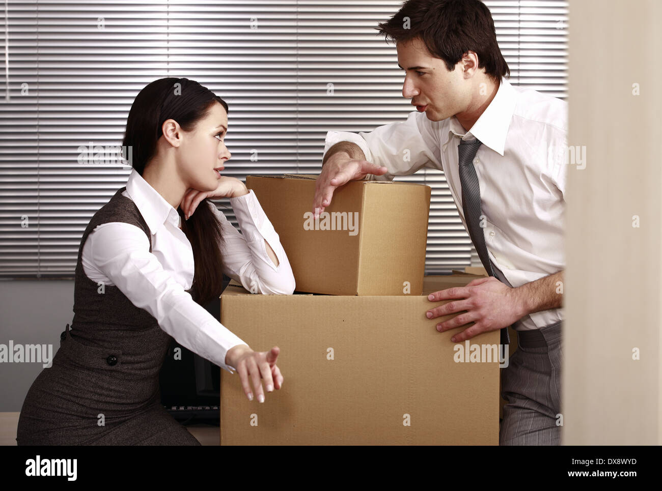Business people in office with boxes Stock Photo - Alamy