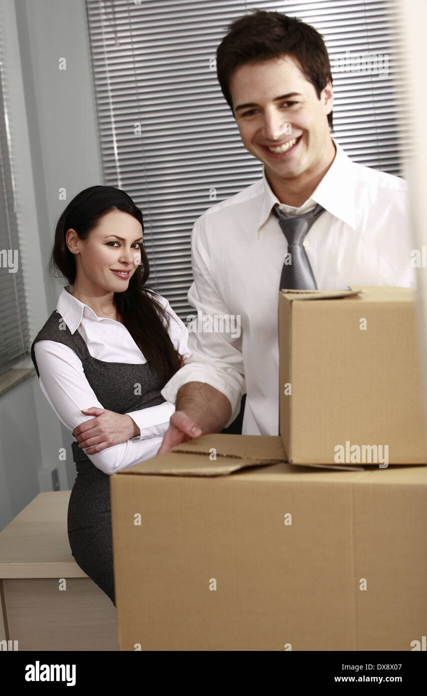 Business people in office with boxes Stock Photo - Alamy