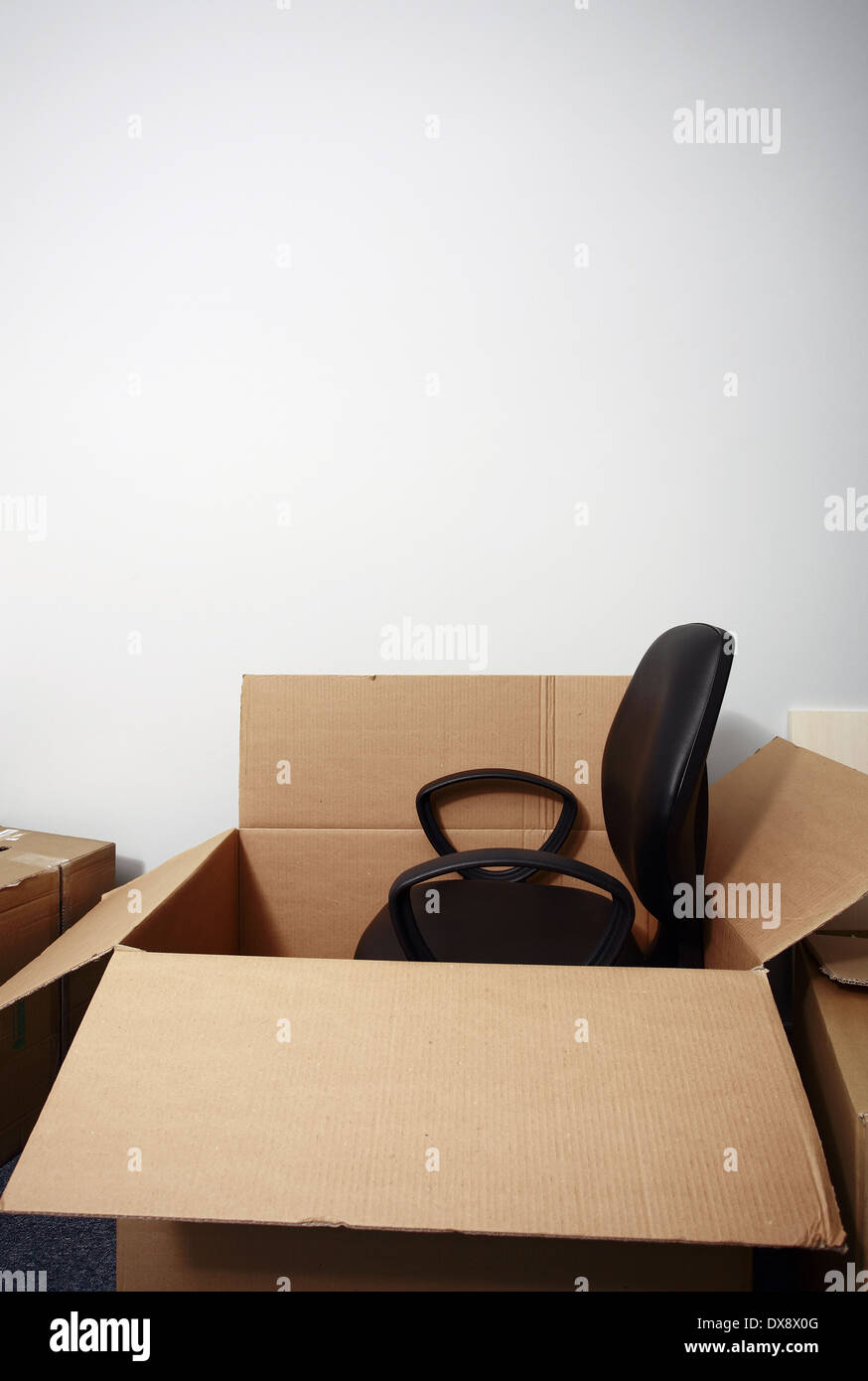 New chair in box Stock Photo - Alamy