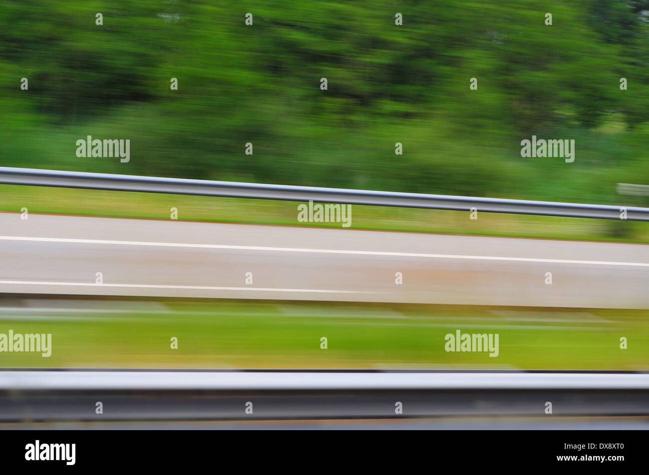 highway shot taken from a moving vehicle suggesting speed Stock Photo ...