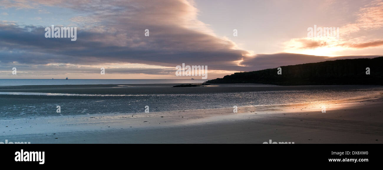 Sunrise at Lligwy Beach, (Traeth Lligwy) on the Isle of Anglesey, North ...