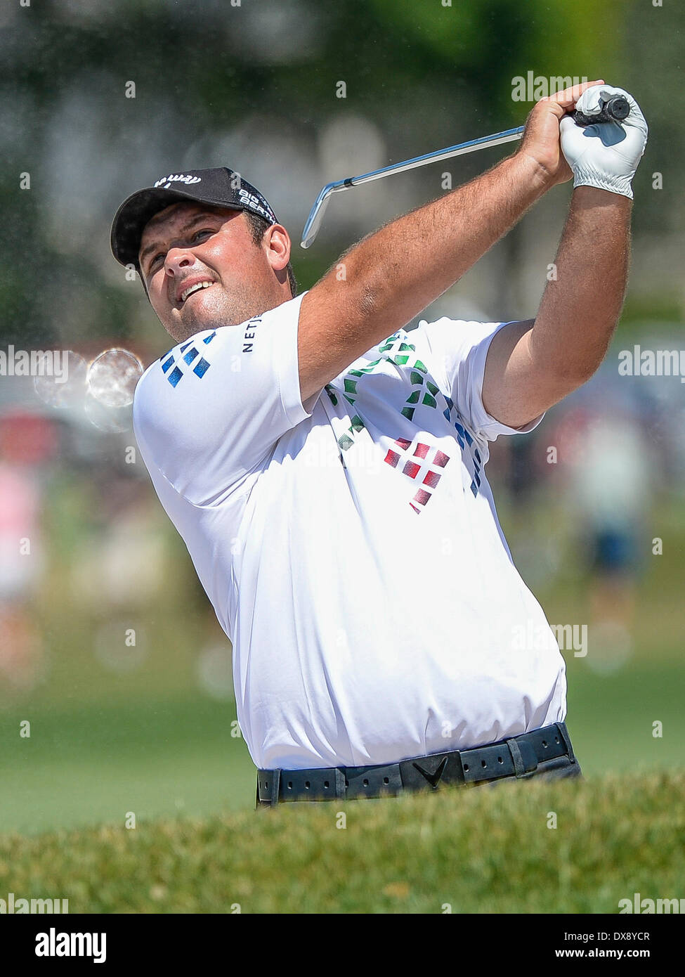 Orlando, Florida, USA. 20th March 2014. Patrick Reed hits out of the ...