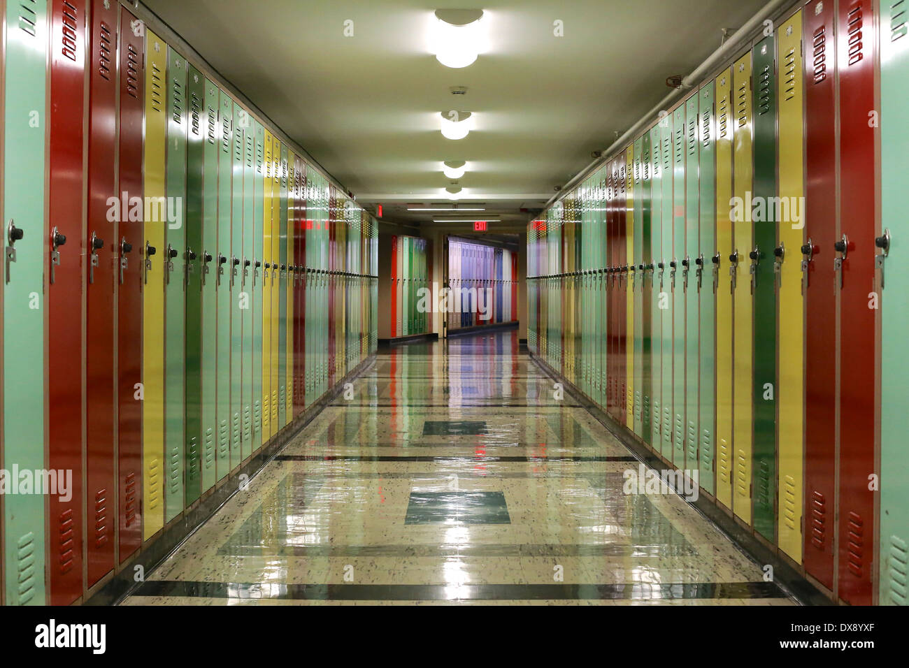 Tunnel-like hallway lined with multi-colored lockers Stock Photo - Alamy