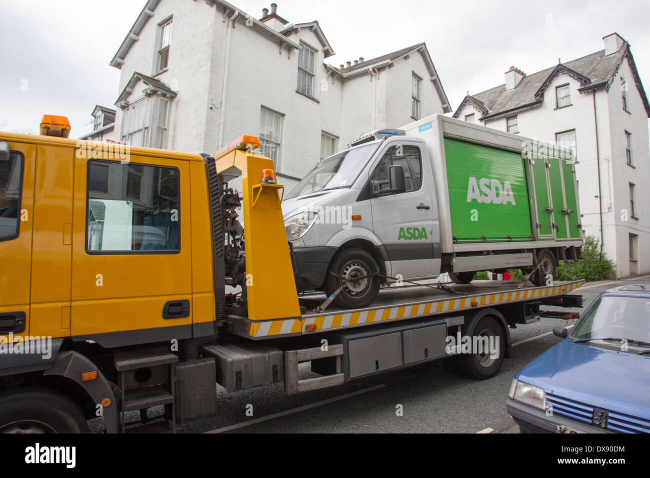 ASADA home delivery van broken down on the back of recovery vehicle ...