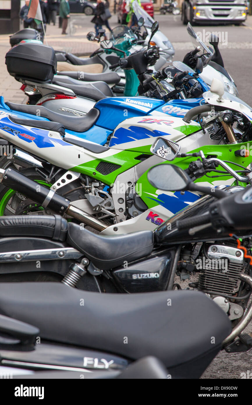 Motorbikes parked in city street, England, UK Stock Photo - Alamy