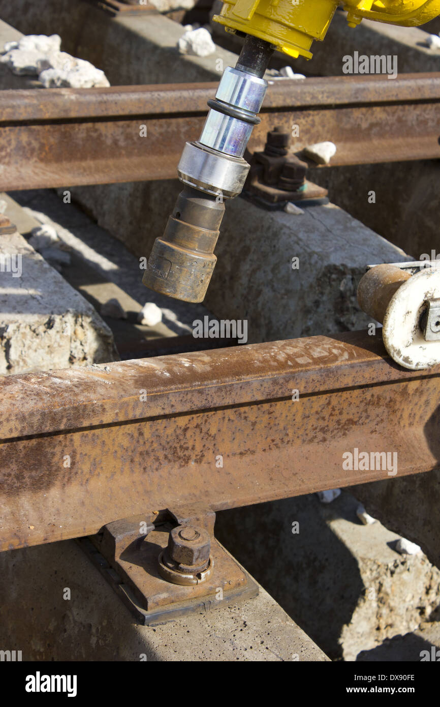 Construction machinery in a railroad construction site Stock Photo - Alamy