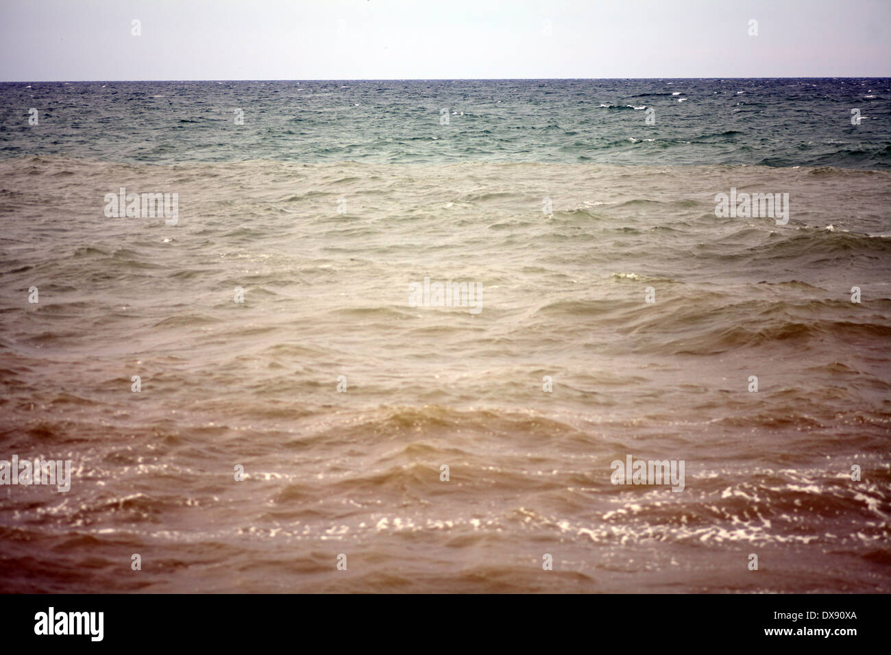 Color shot of a dirty agitated sea Stock Photo - Alamy