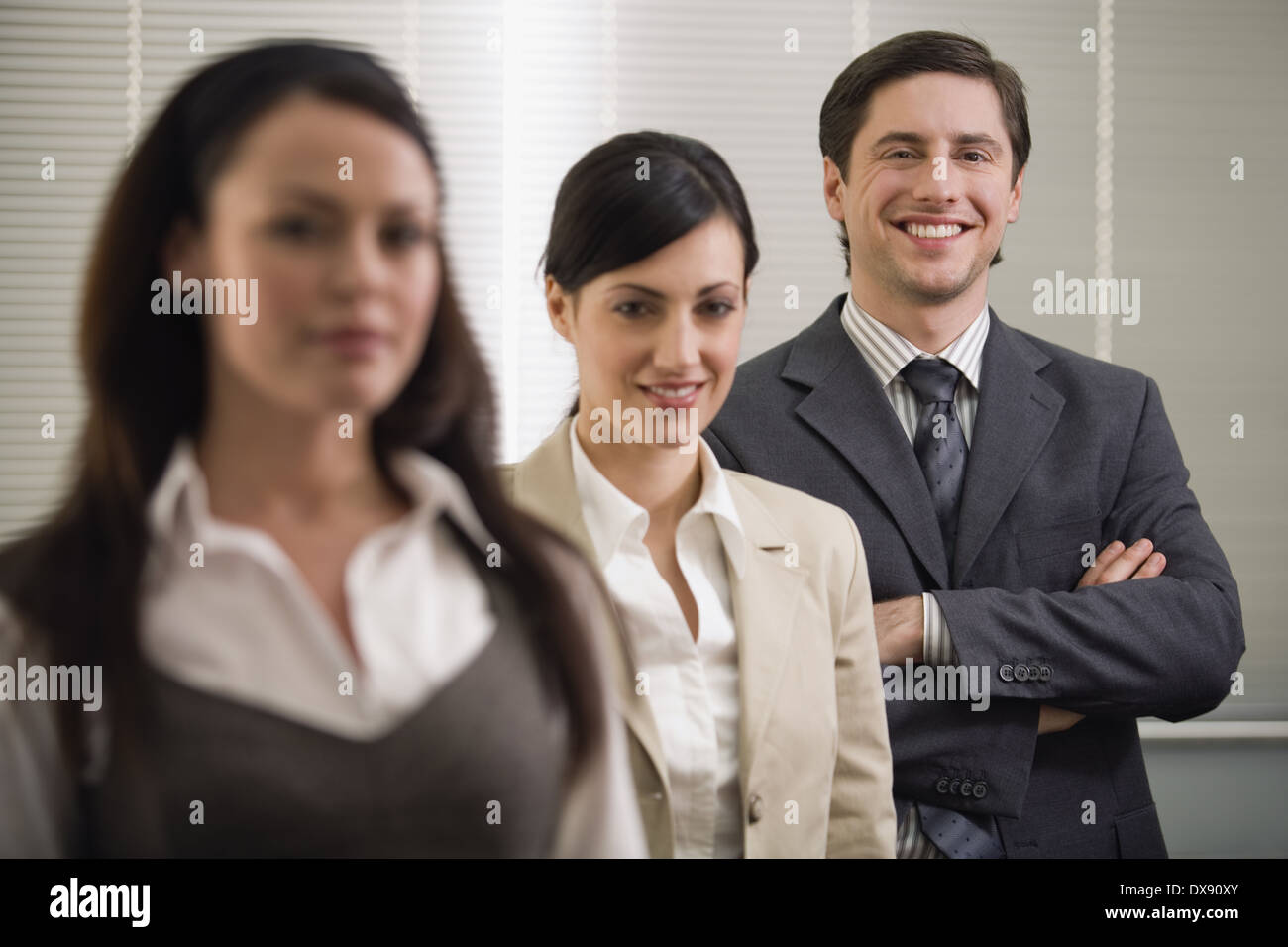 Three business people Stock Photo - Alamy