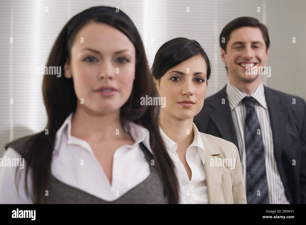 Three business people Stock Photo - Alamy