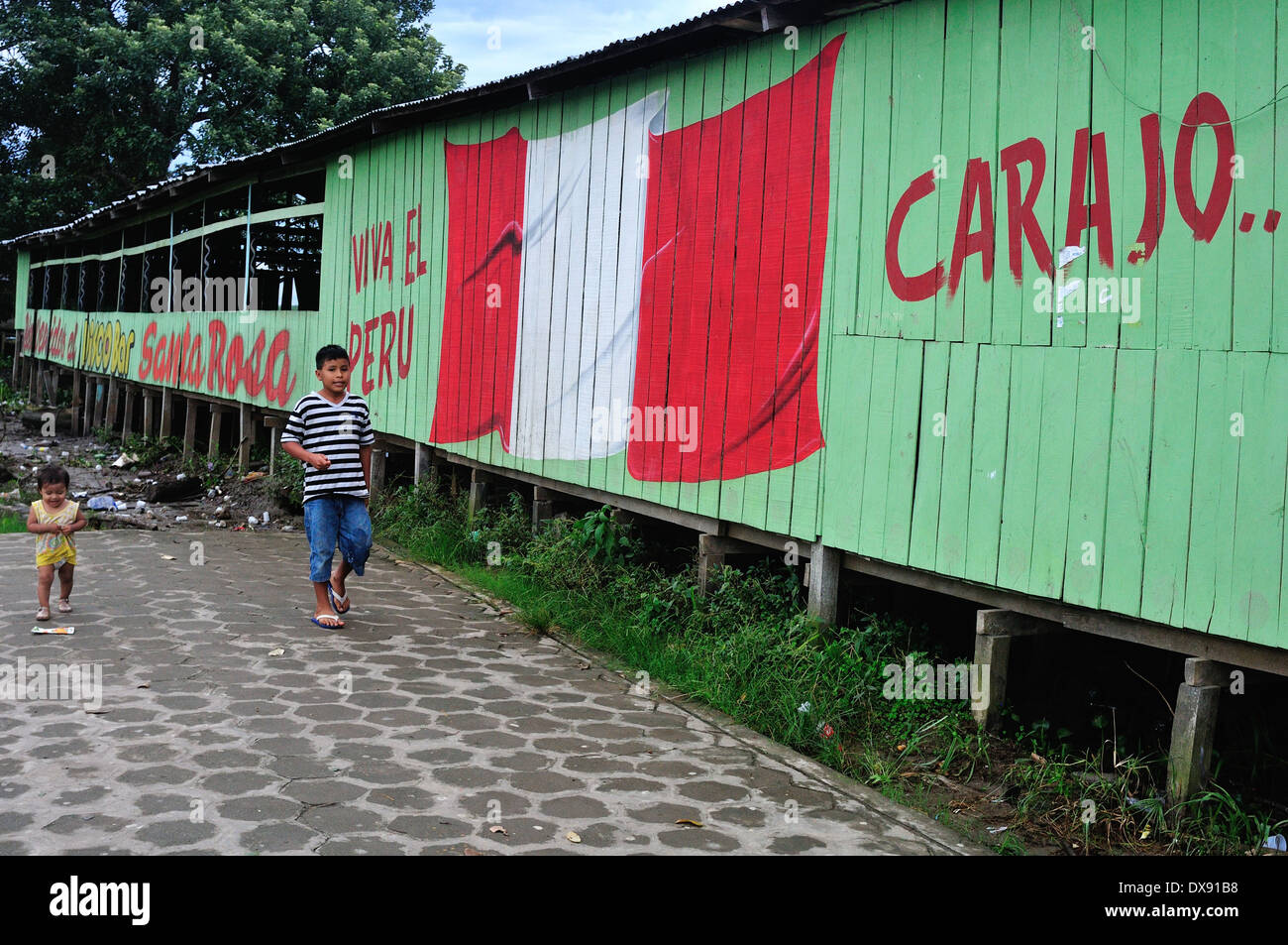 Peruvian Flag - Main street in SANTA ROSA Island . Department of Loreto ...