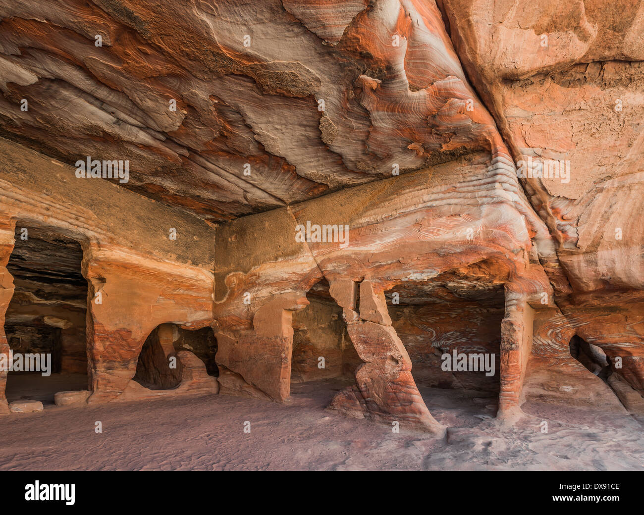 rocks caves in Nabatean Petra Jordan middle east Stock Photo - Alamy