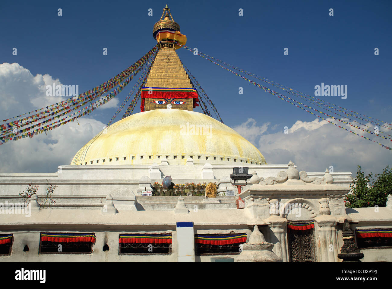 The great stupa of Boudhanath-Bodhnath with the eyes of the Buddha and ...