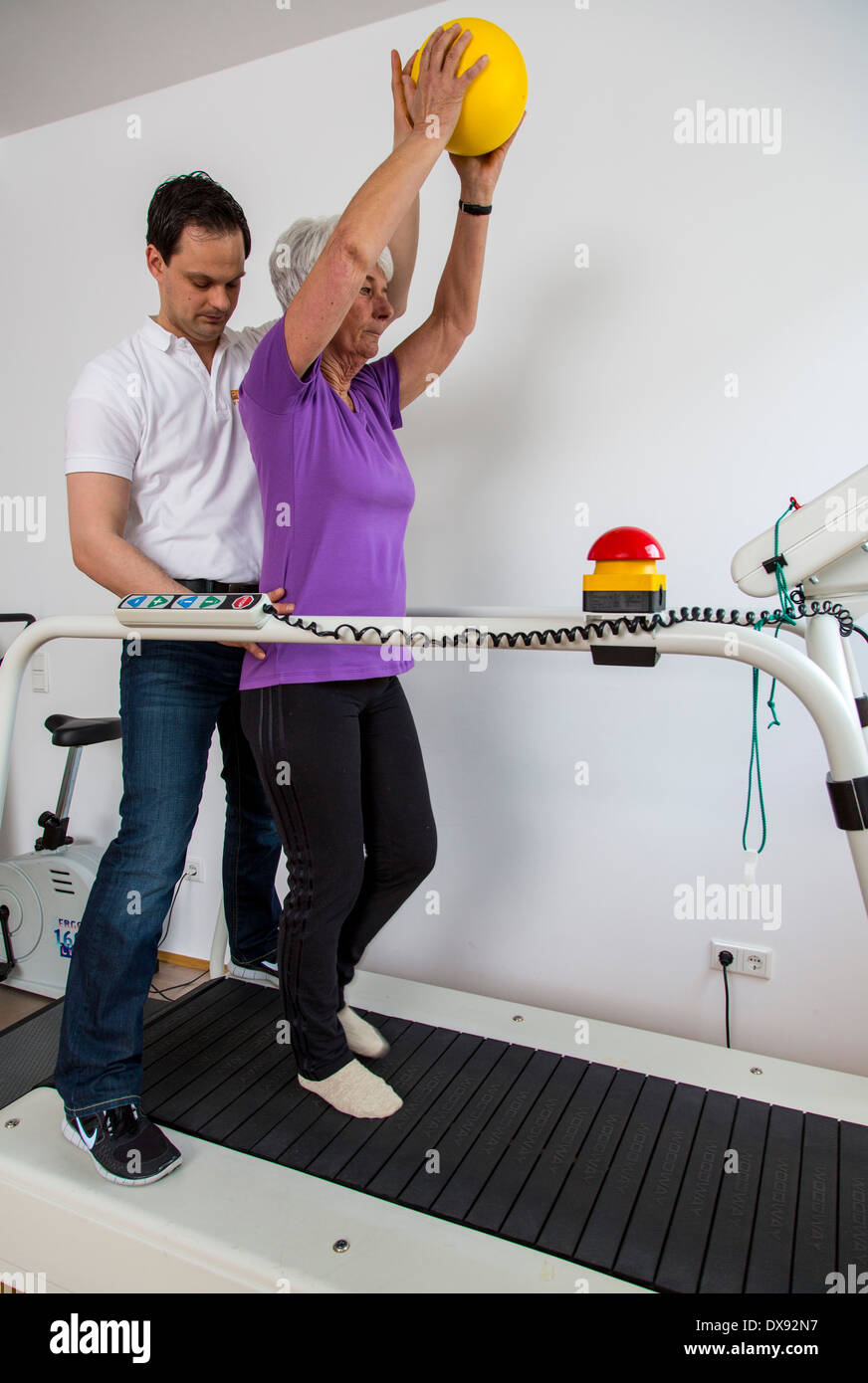 Physiotherapy practice therapist with patient, gait training, running ...