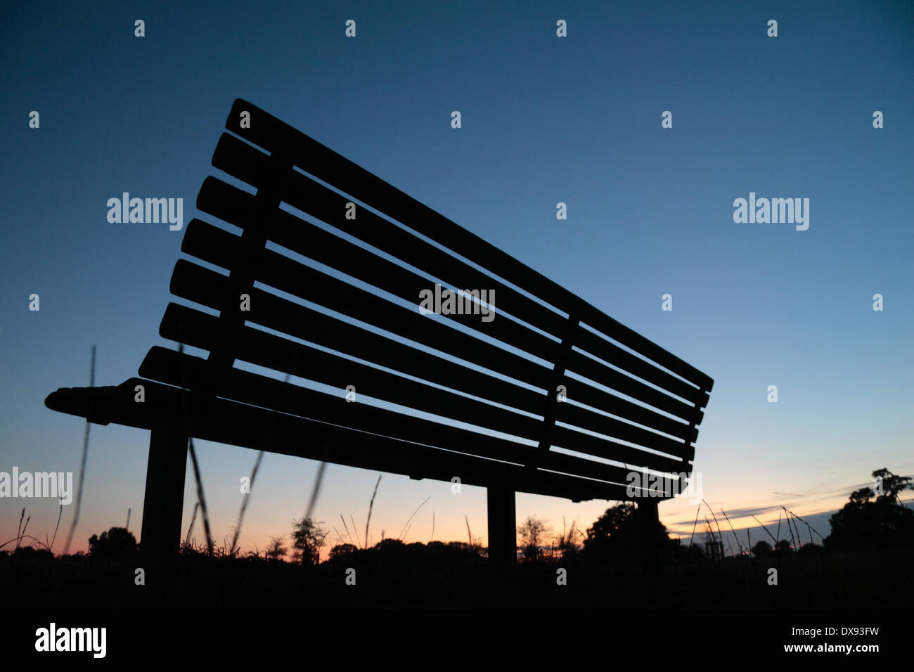 A park bench at dusk (in Bushy Park, London, UK Stock Photo - Alamy