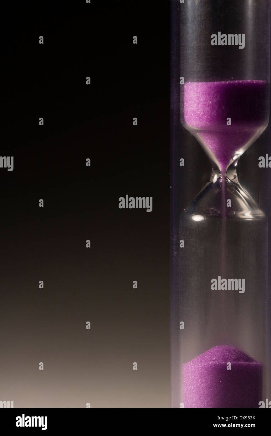 Hourglass with sand falling hi-res stock photography and images - Alamy