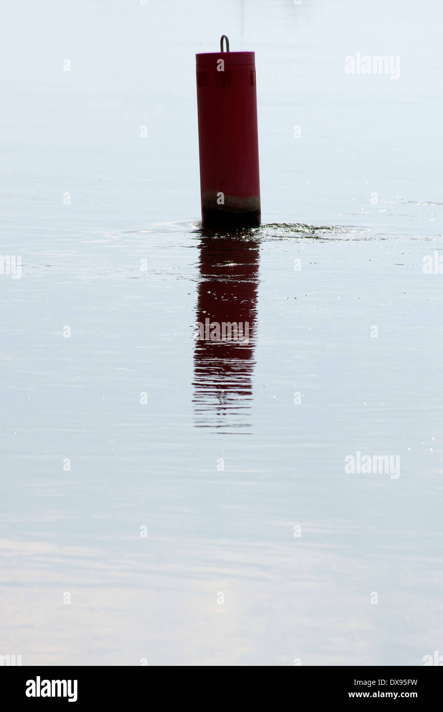 Red buoy in floating river hi-res stock photography and images - Alamy