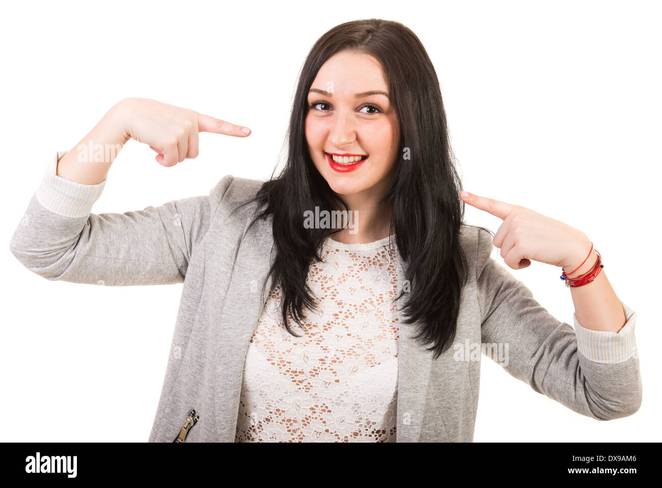 Happy woman pointing to her smile isolated on white background Stock ...