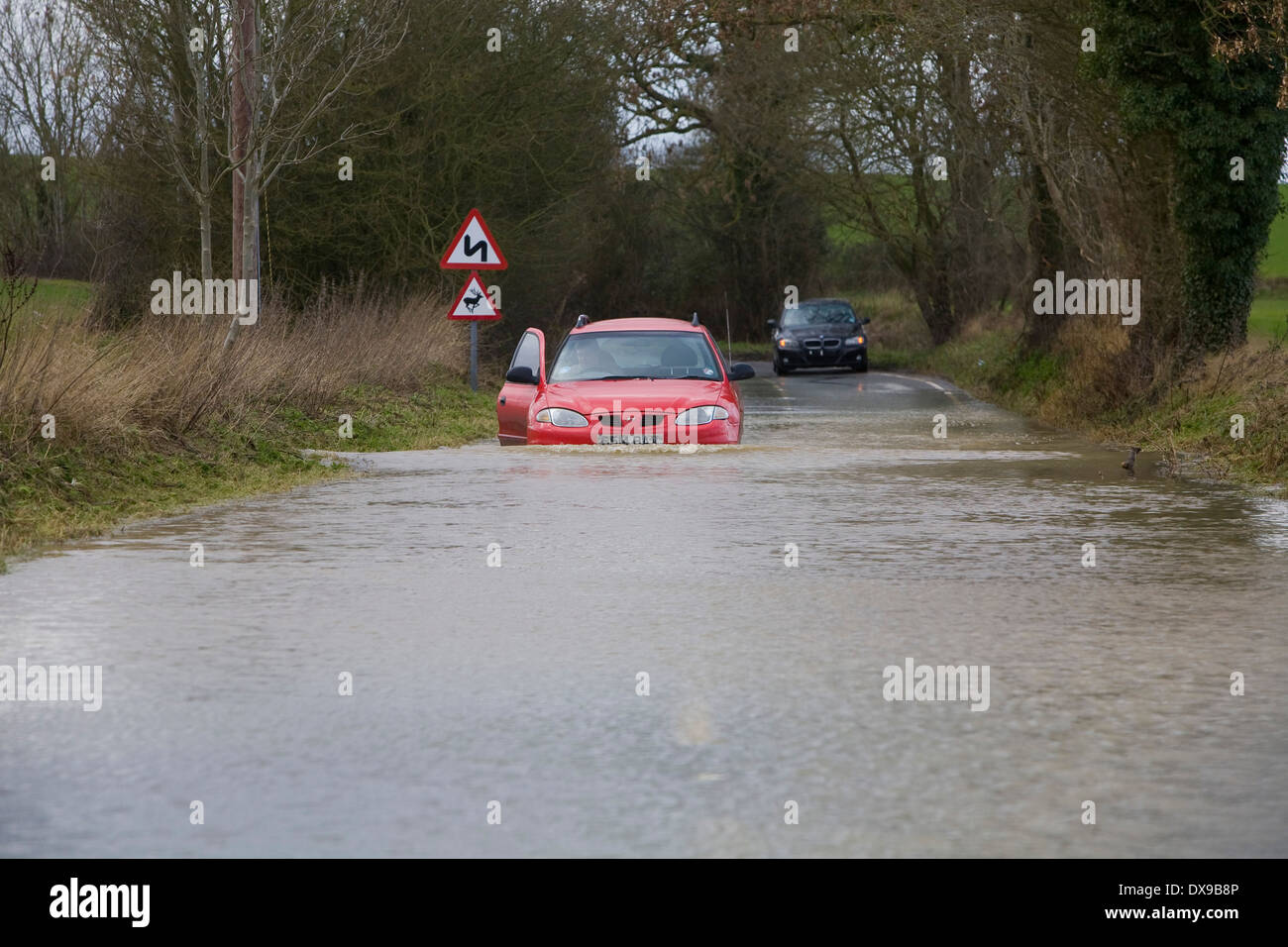Cars struggle through Floods water in Steeple Bumpstead Essex today ...